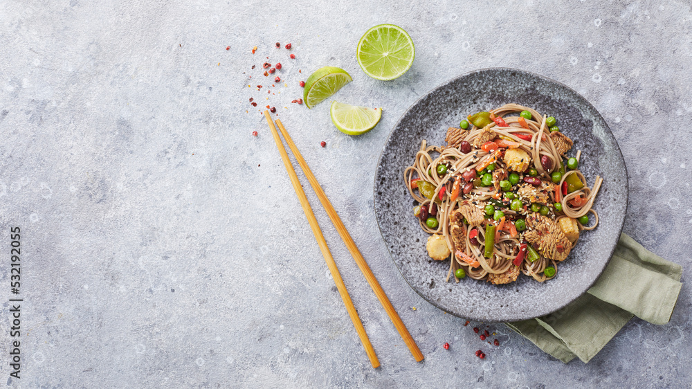Wok with turkey meat, soba noodles, corn, green peas, green beans and ...