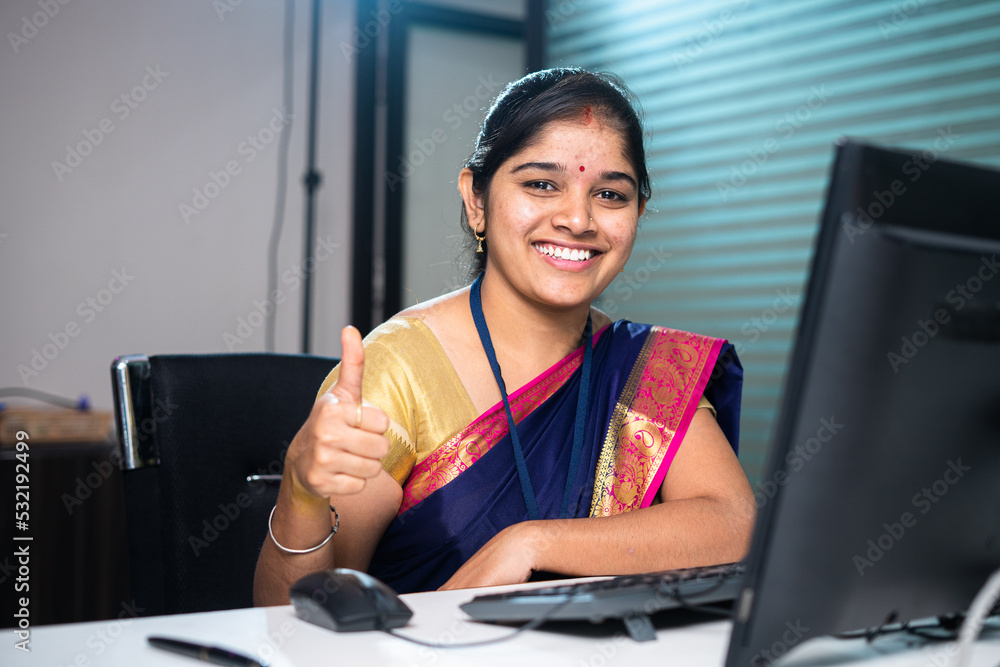 Happy smiling corporate or banking employee showing thumbs up by ...