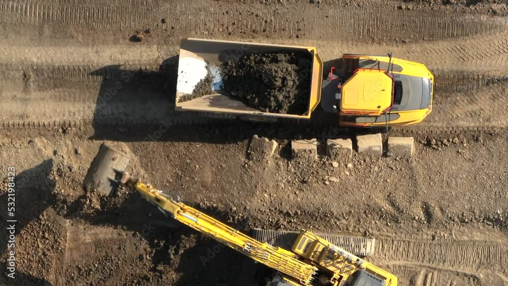 Tipper Truck Being Loaded Up With Earth by a Digger Stock Video | Adobe ...