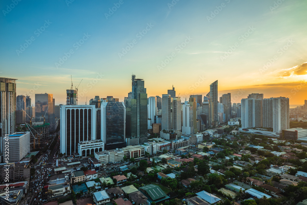 skyline of makati in metro manila, philippines at sunset Stock Photo ...