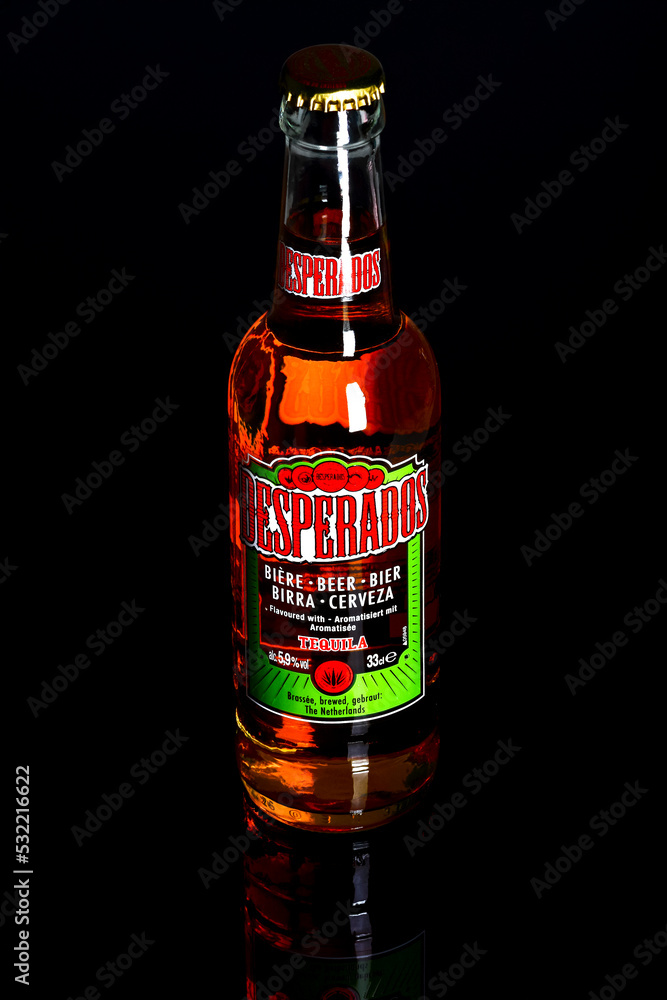 Bottle of desperados beer flavoured with tequila isolated on black ...
