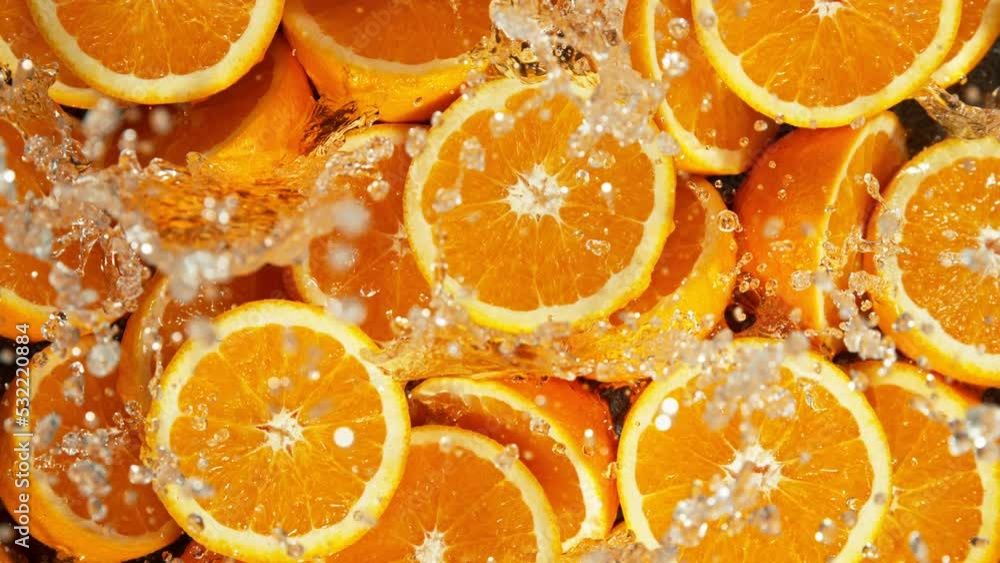 Super Slow Motion Shot of Splashing Fresh Oranges. Filmed on High Speed ...