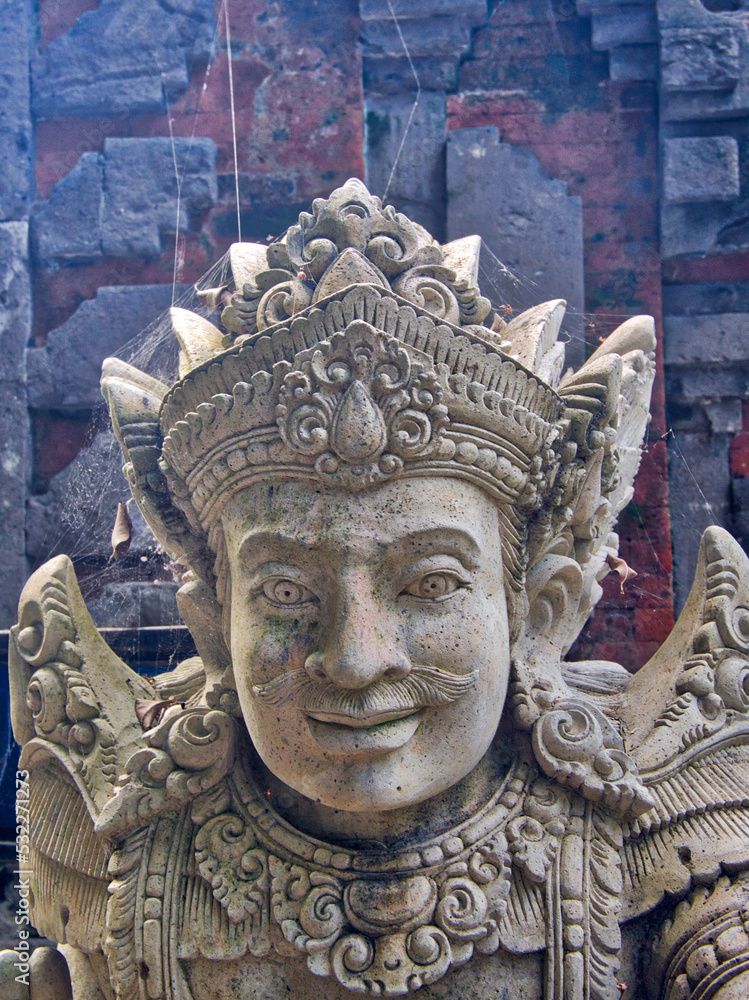 Indonesia, Bali, Ubud. Stone statue in Pura Tirta Empul, the water ...