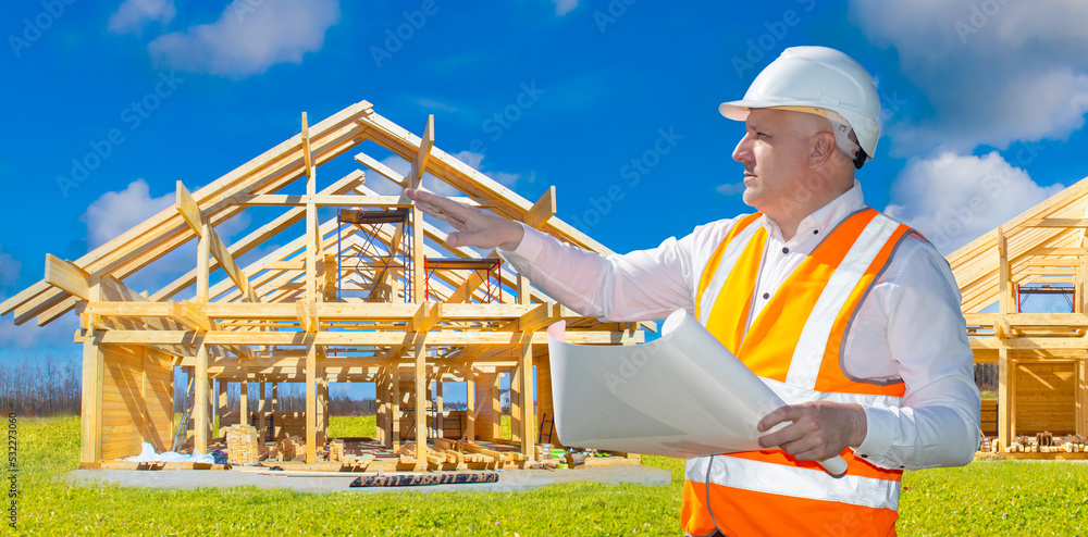 Construction company worker. Builder points his hand. Man near frame ...