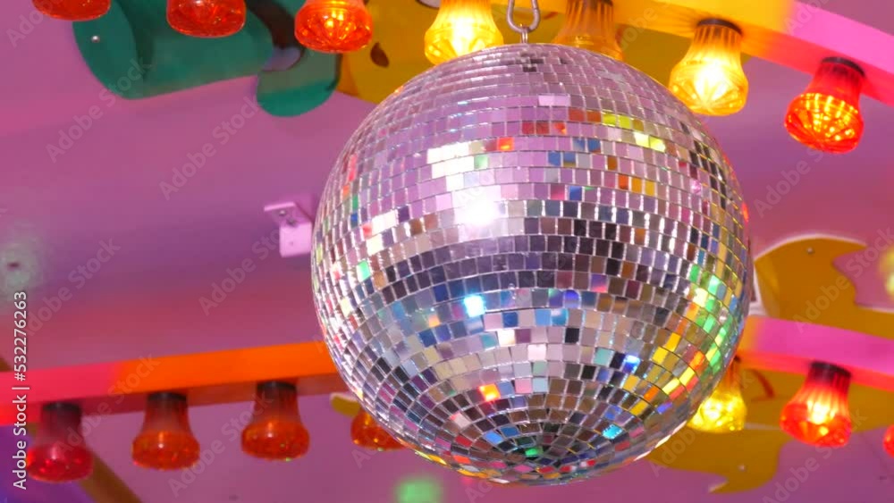 Silver disco ball at a party or celebration. Lighting design on the ...