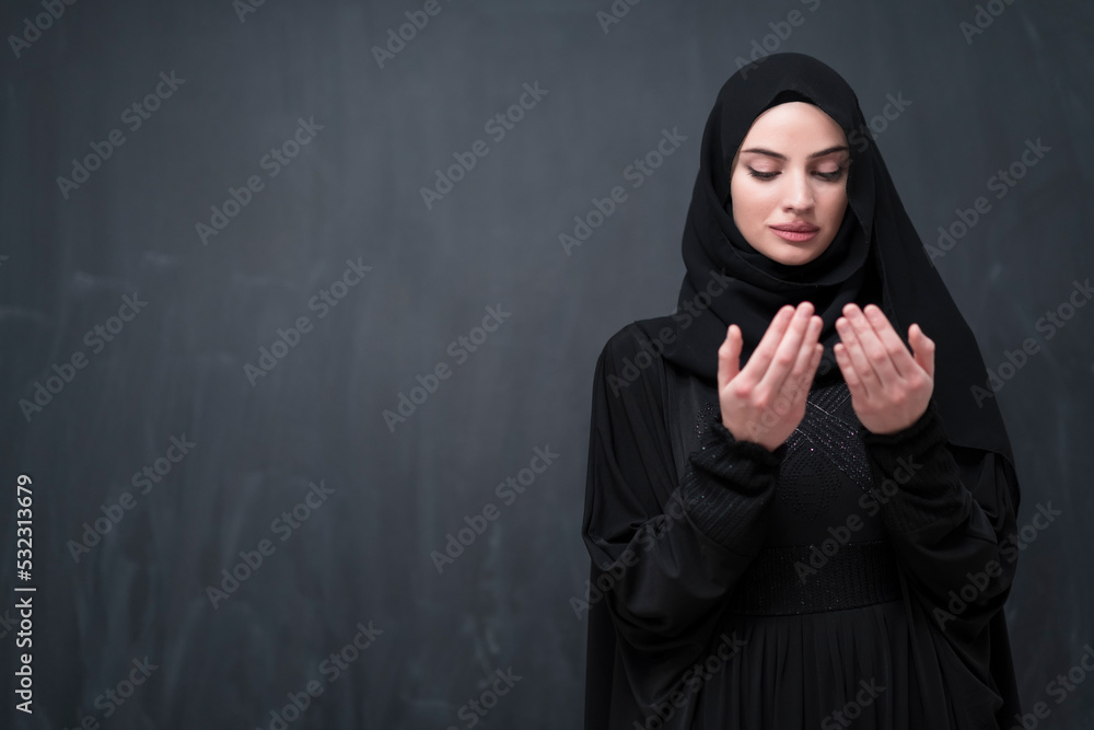 Portrait of beautiful muslim woman in fashionable dress with hijab ...