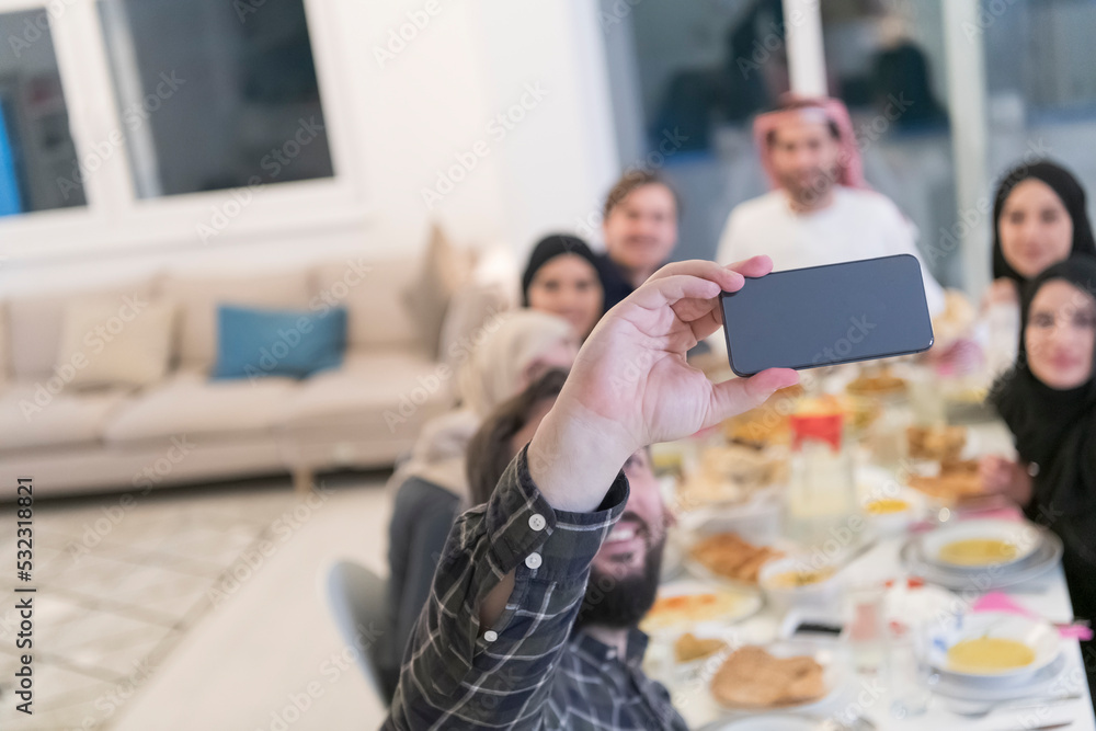Eid Mubarak Muslim family having Iftar dinner taking pictures with ...