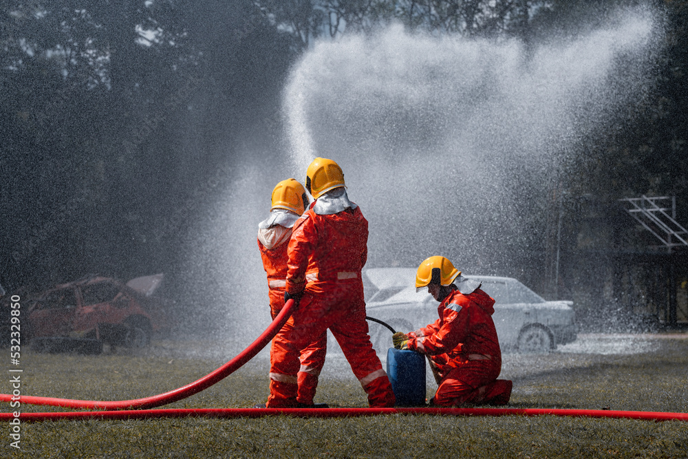 Firefighters safety using twirl water fog type fire extinguisher to ...