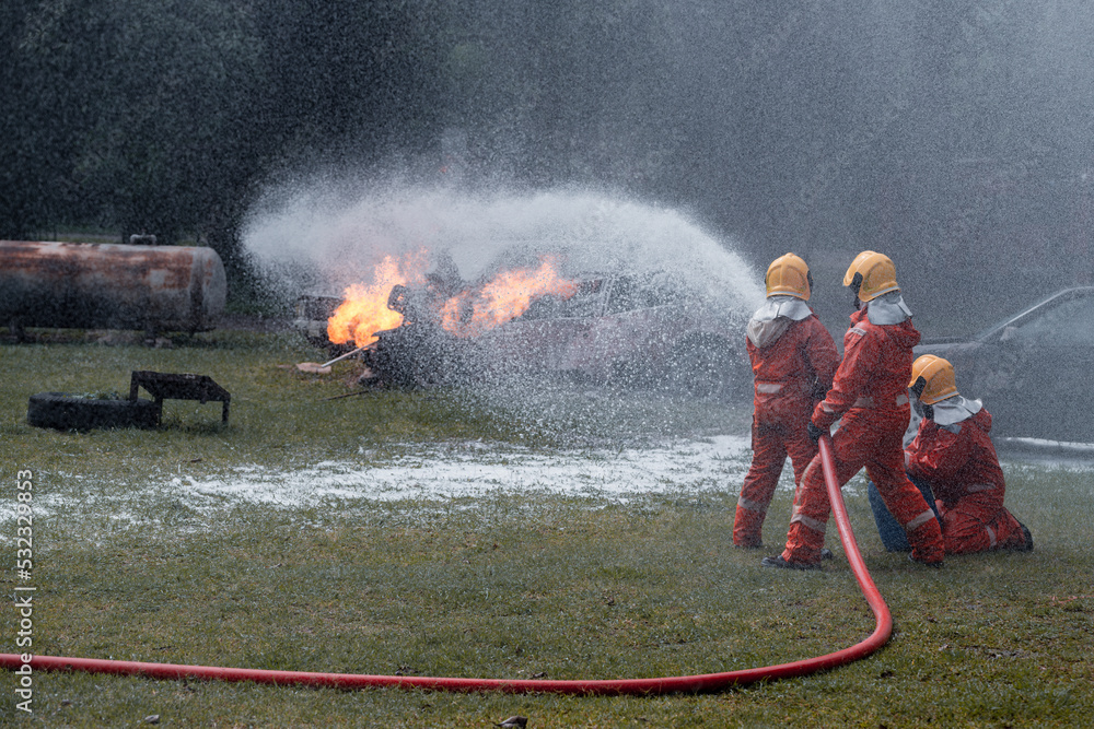 Firefighters safety using twirl water fog type fire extinguisher to ...