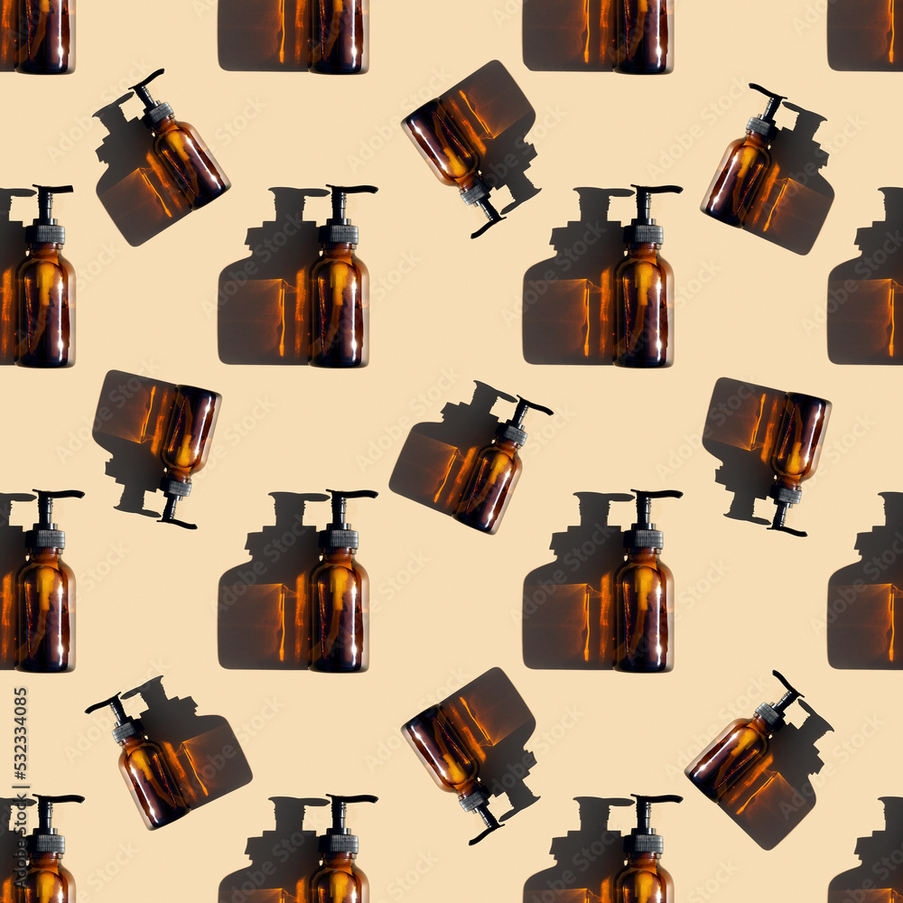Seamless pattern made with brown glass bottle with pump of cosmetic ...