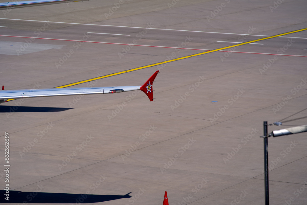 Wing tip of Edelweiss Air airplane type Airbus A320-214 register HB-JJK ...