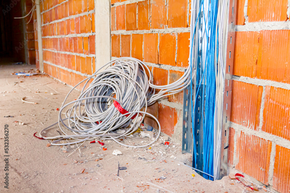 Cable tray with installation cables between floors in building Stock ...
