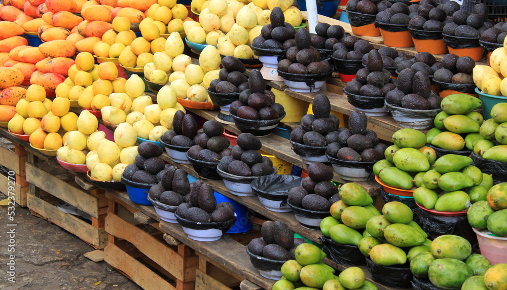 Mexican local street market displays colorful fresh tropical fruits in ...
