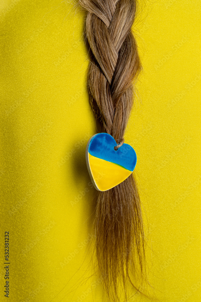 Women's braid with a heart in the patriotic colors of the Ukrainian ...