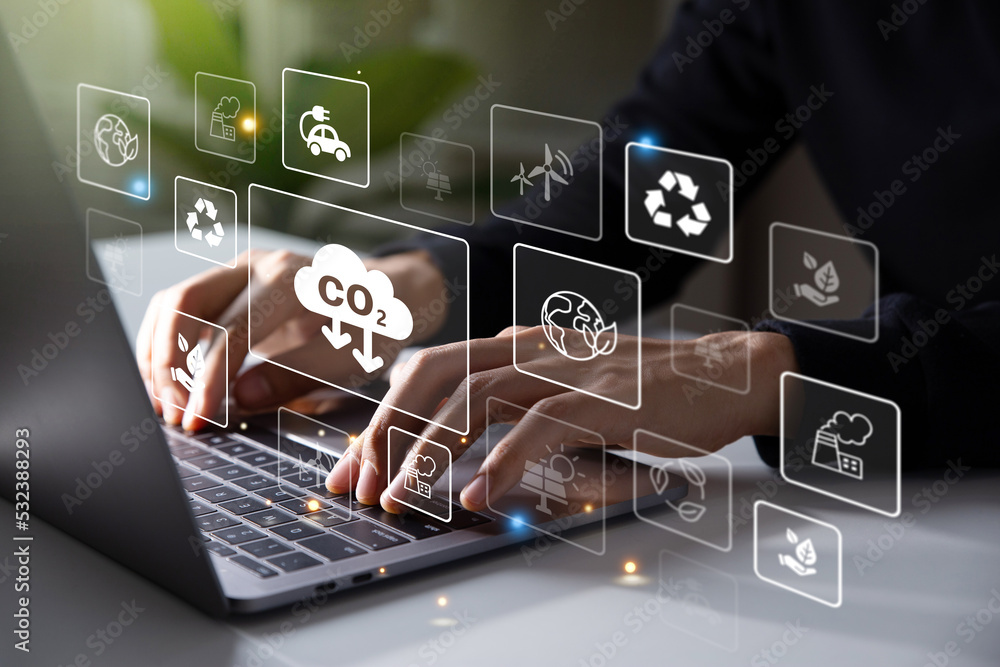 Businessman use laptop computer with environment icon for reduce CO2 ...