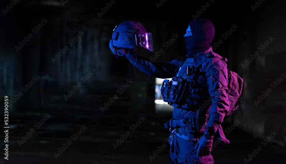 Army soldier in Combat Uniforms with an assault rifle and combat helmet ...