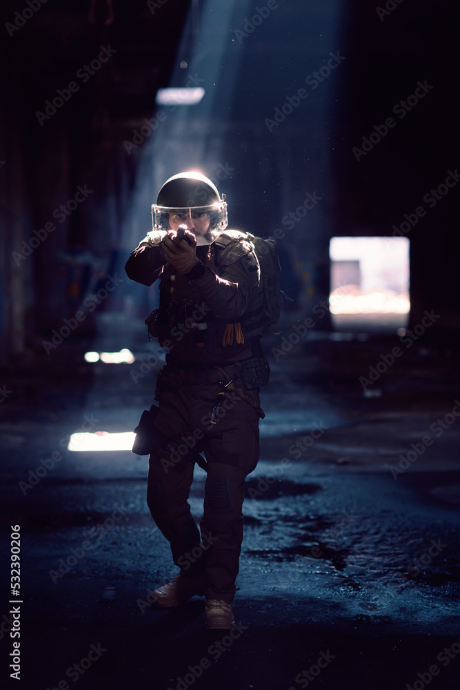 Army soldier in Combat Uniforms with an assault rifle and combat helmet ...