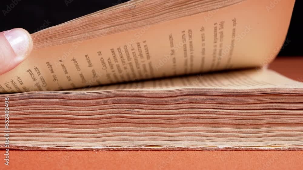 Vidéo Stock Female Fingers Leafing Through Pages of Old Shabby Book on ...