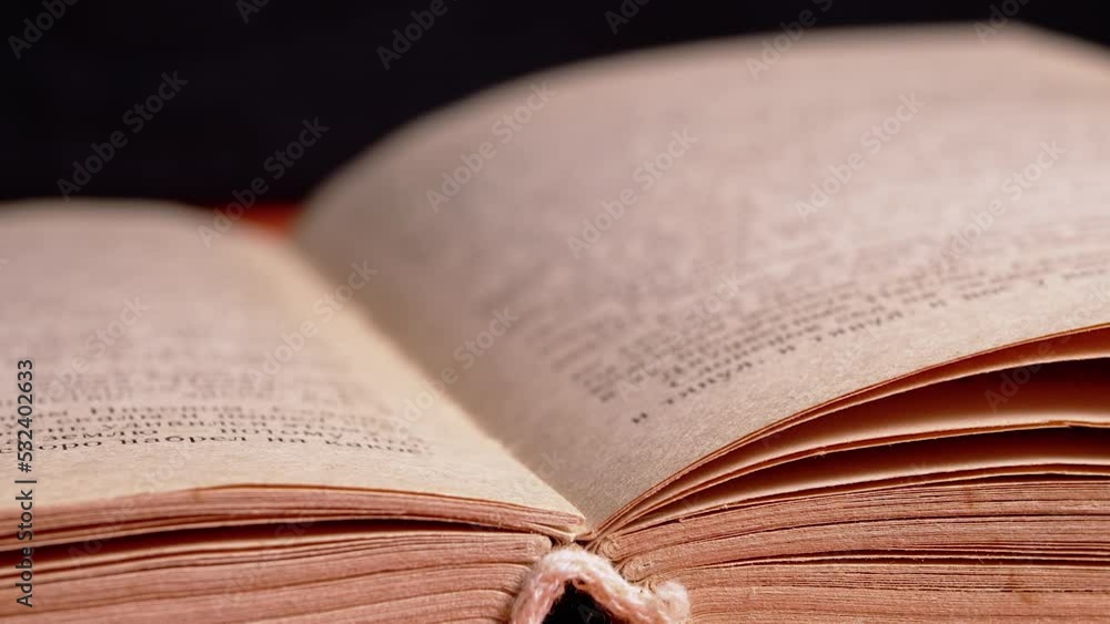 Old Antique Thick Open Book with Yellow Pages Lies on Table in Dim ...