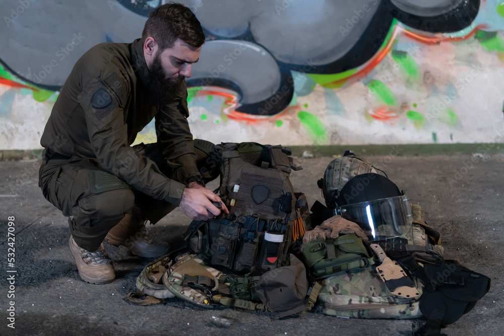 Army body armor, helmet and ammunition, Kalashnikov assault rifle with ...