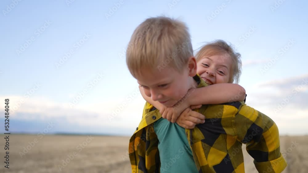 Happy family. Children play in park.Girl piggyback ride on boy. Family ...