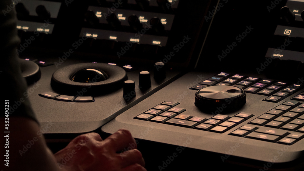 Edit video production control panel in studio. Editor editing and grade ...
