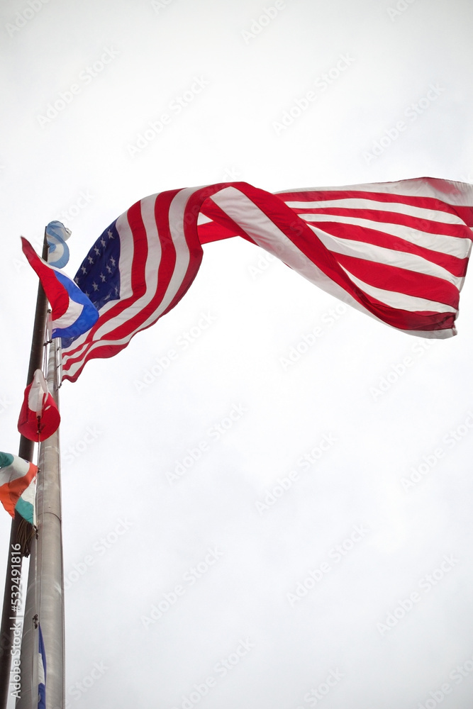 american flag on pole, view from below with white background Stock ...