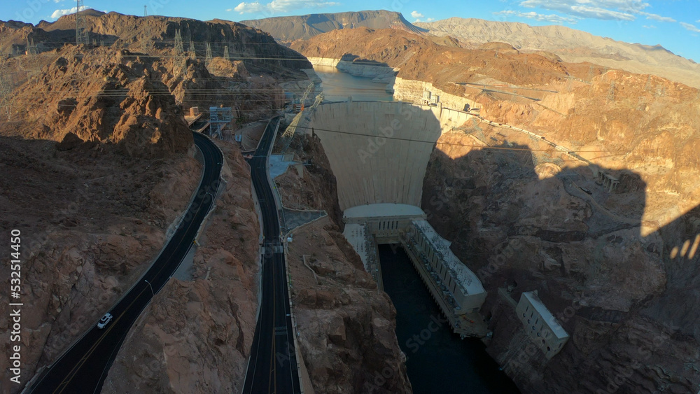 Hoover Dam is a concrete arch-gravity dam in the Black Canyon of the ...