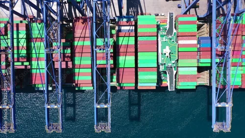 Aerial top down pan video of industrial cargo container logistics ...