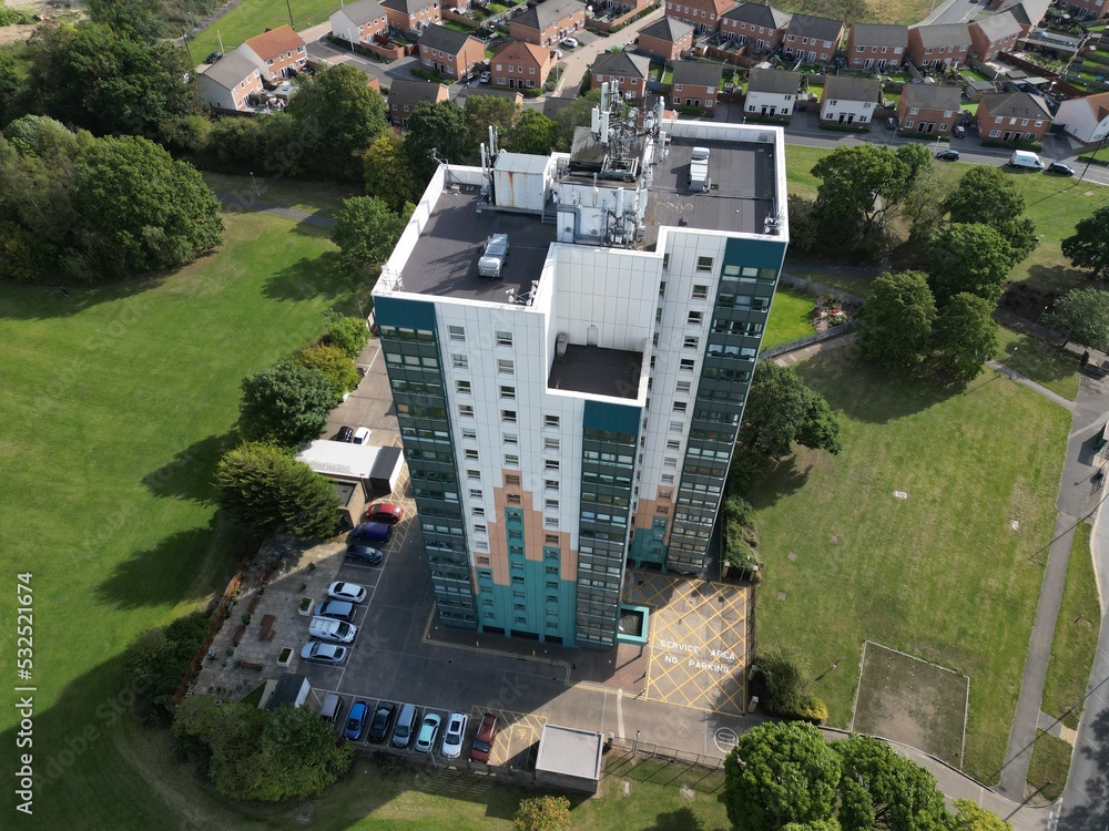 Arial view of suburban 1960s residential tower block with flammable cladding. Bayswater Court ...