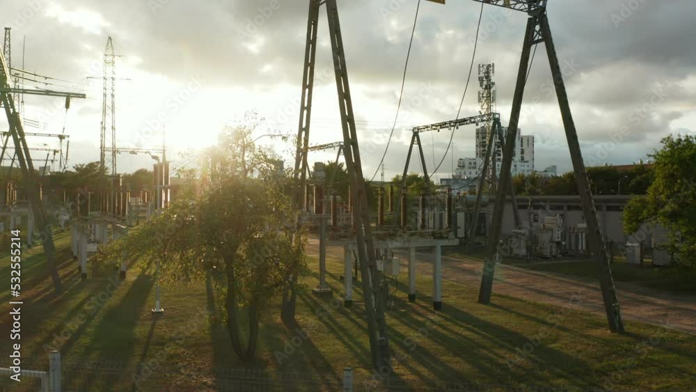 Supports with insulators and transformers at modern electrical ...