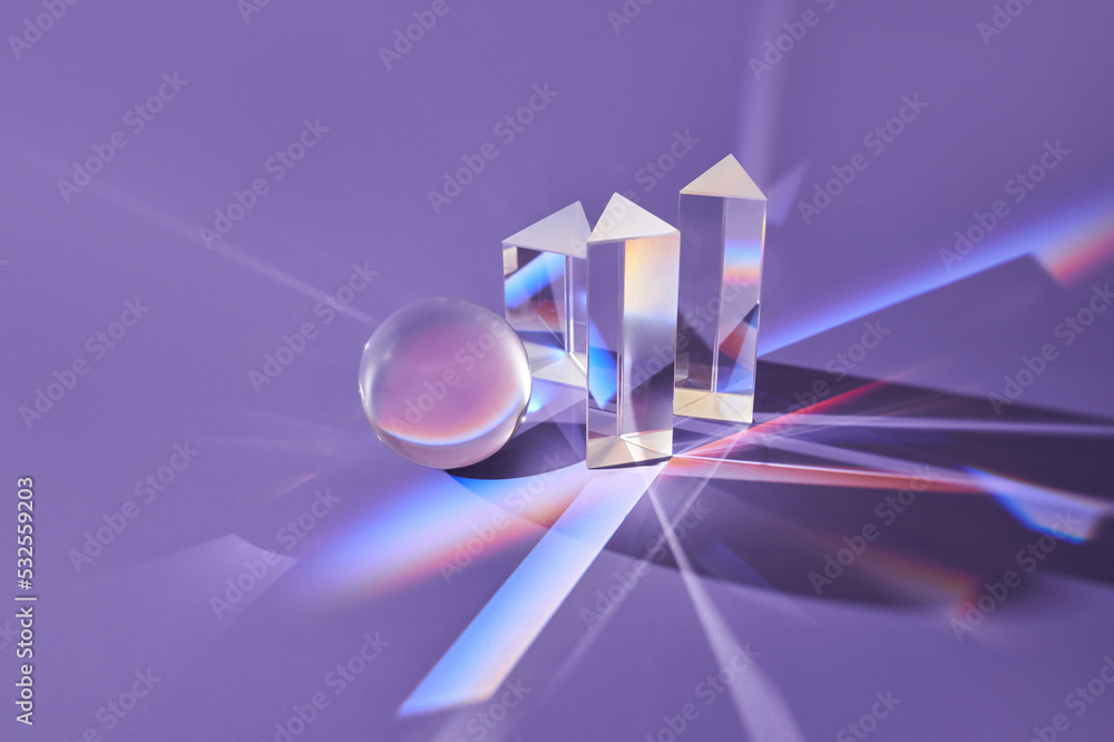 Different crystal prisms with mysterious light. Stock Photo | Adobe Stock