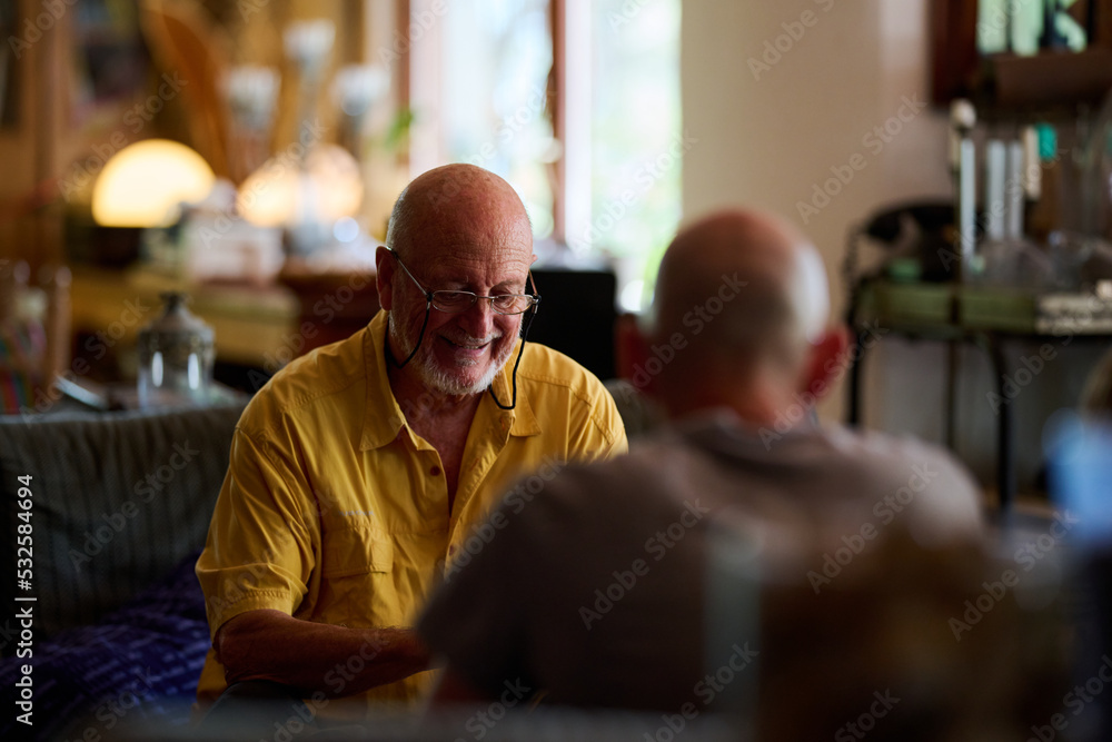 Smiling father spending time with his son at home. Stock Photo | Adobe ...