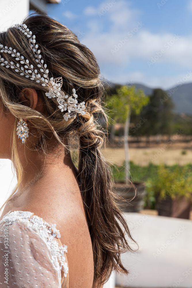 Profile of a bride showing her hairstyle wearing a wedding dress Stock ...