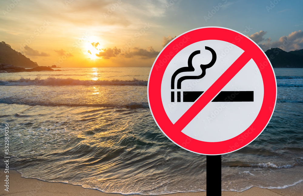 no smoking in public places sign on black iron pillar In nature, public ...