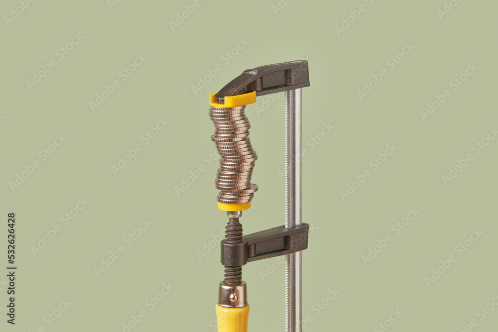 Stack of cents being measured by vernier caliper. Stock Photo | Adobe Stock