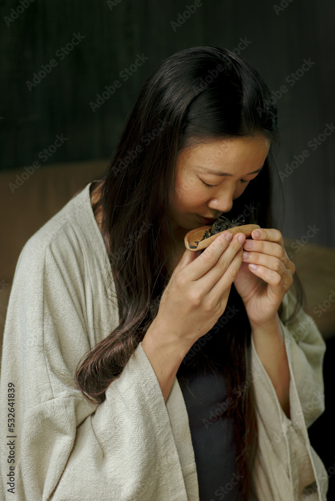 Young asian woman sniffing tea leaf before tea ceremony Stock Photo ...