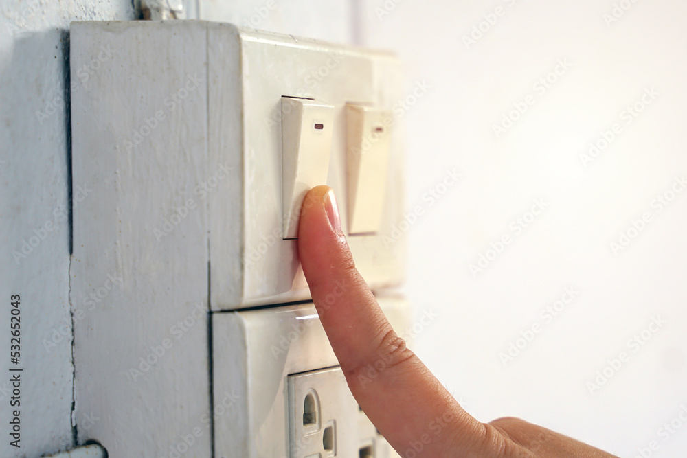 Turn off the lights before leaving the office. Concept to conserve ...