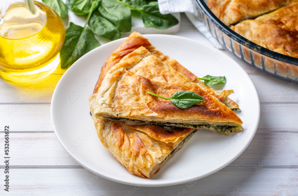 Spanakopita, greek phyllo pastry pie with spinach and feta cheese ...