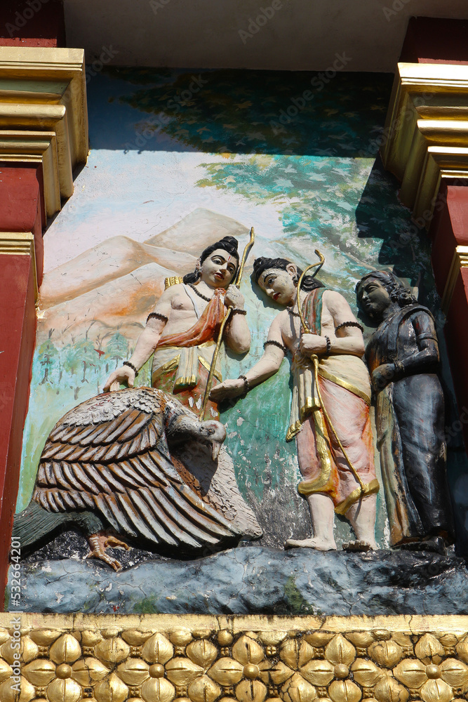 Sita, Rama and Lakshman meet Jatayu. Old art on the wall of a hindu ...