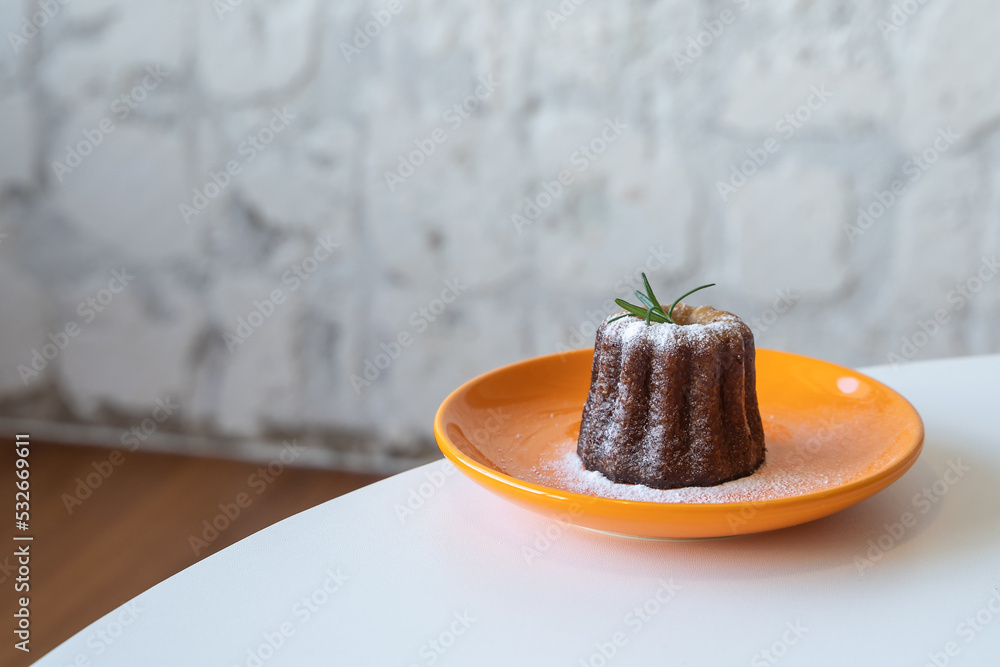 Caneles de bordeaux is a small pastry with rum and vanilla, traditional ...