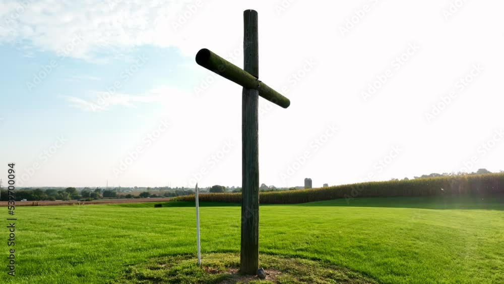 Cross in rural countryside representing Jesus crucifixion and death ...
