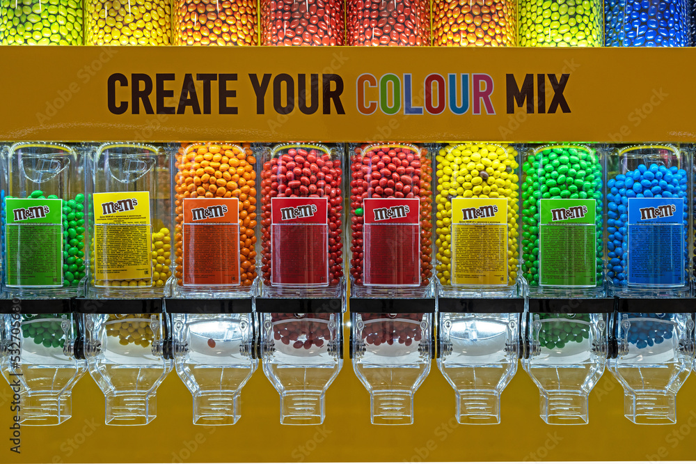 M&M'S different colors candies at store. M&M'S stand in the supermarket ...