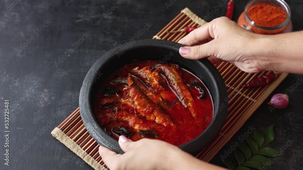 Spicy sardine fish curry gravy , 4k video of serving spicy Kerala red ...
