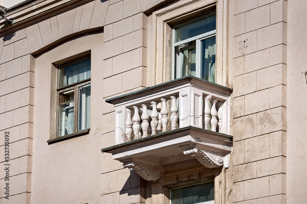 Balcony with with balustrade, old residential building. Stalinist ...