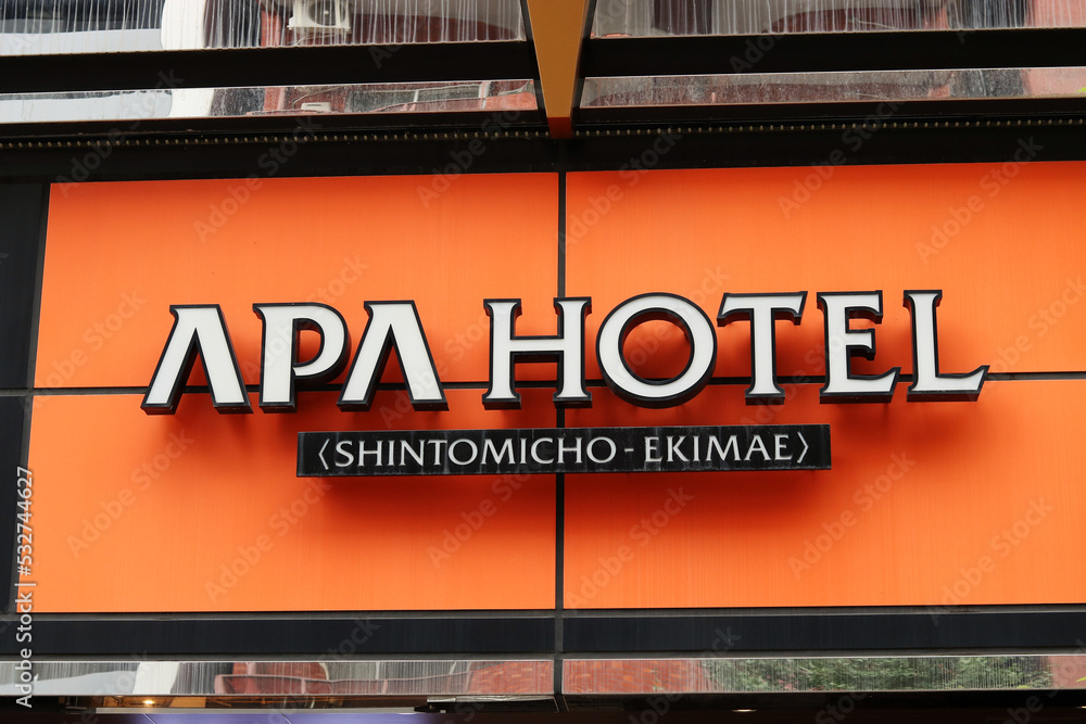 TOKYO, JAPAN - July 13, 2021: Sign on an APA hotel in central Tokyo ...