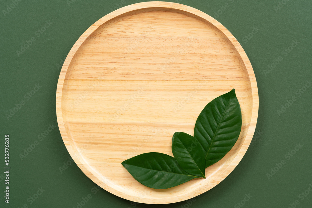 top view flat lay circle round natural wooden plate texture on dark ...