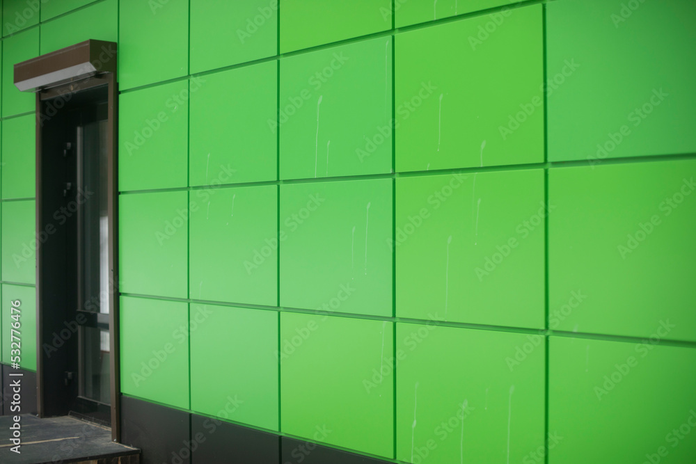 Green building. One-storey office. Paneling. Stock Photo | Adobe Stock