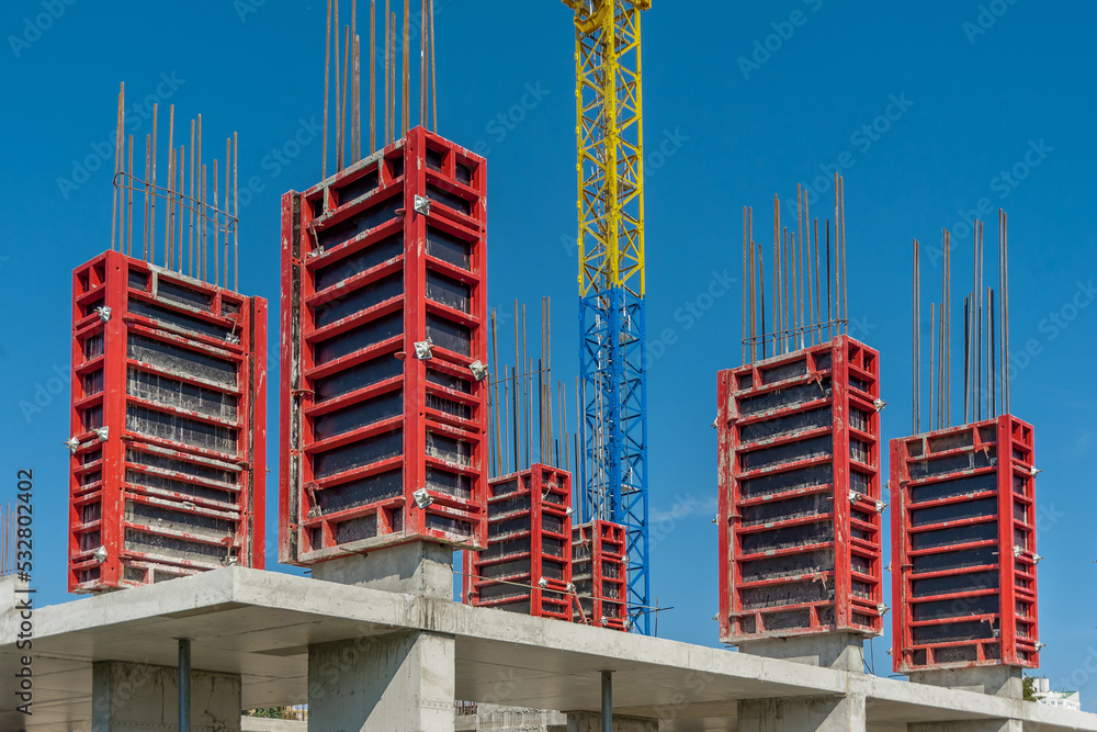 Formwork panels and crane at industrial construction. Stock Photo ...