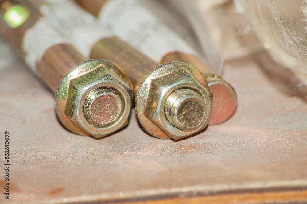 Fotka „Hexagonal nut and washer on metal galvanized anchor bolt end on ...